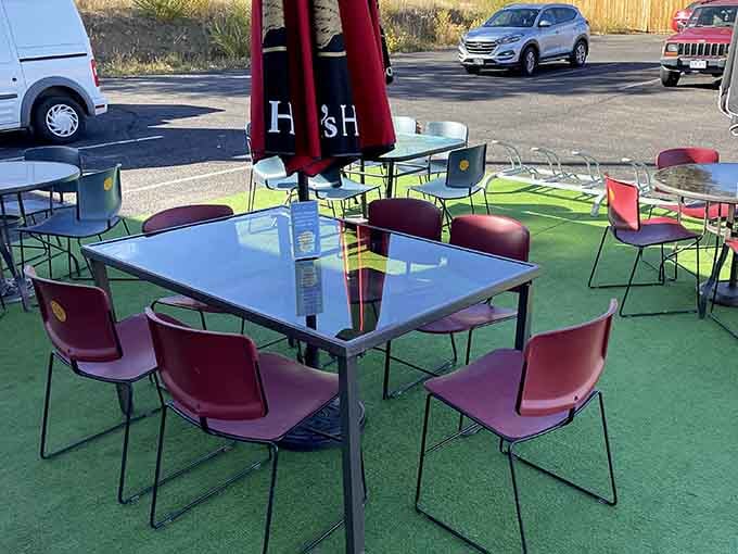 Outdoor seating with colorful tables means you can enjoy Colorado sunshine alongside your sandwich masterpiece any sunny day.