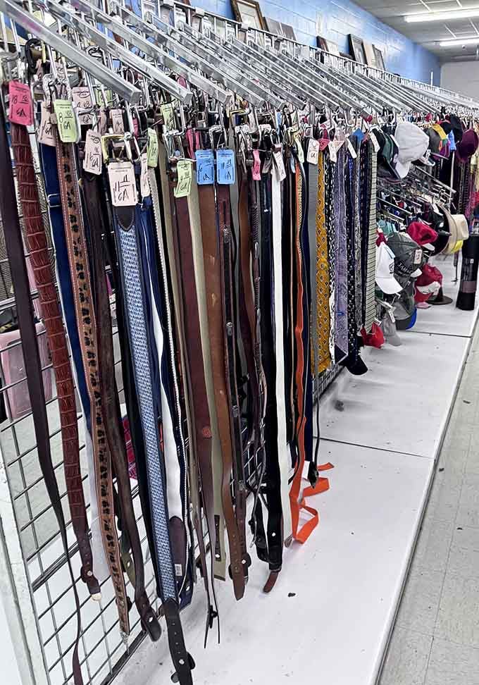 Belts hanging in formation like a leather rainbow, offering the perfect finishing touch for every outfit imaginable.