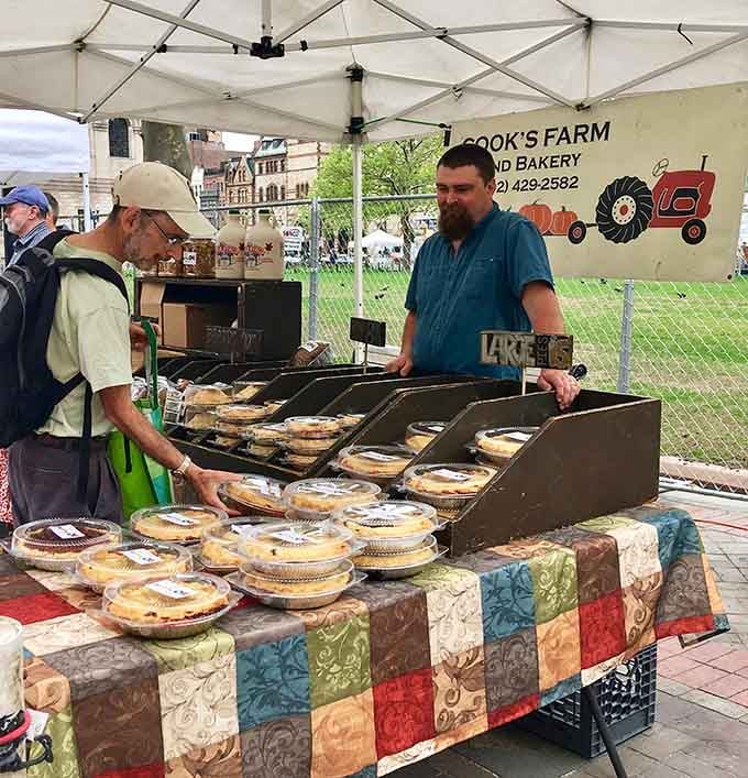 Fresh pies lined up like circular works of art, each one representing someone's grandmother's secret recipe perfected.