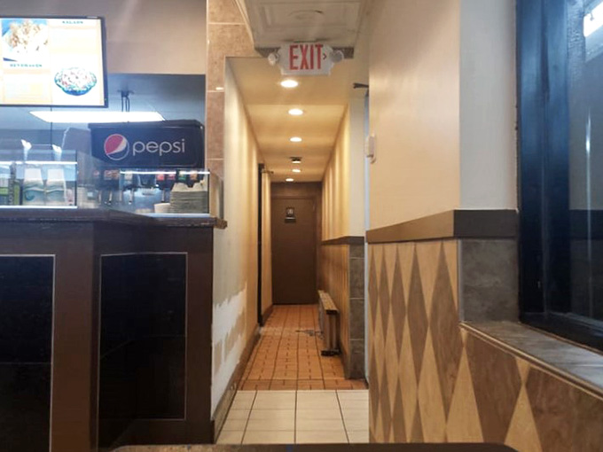 Even the hallway to the restrooms maintains that clean, modern aesthetic throughout the entire restaurant space.