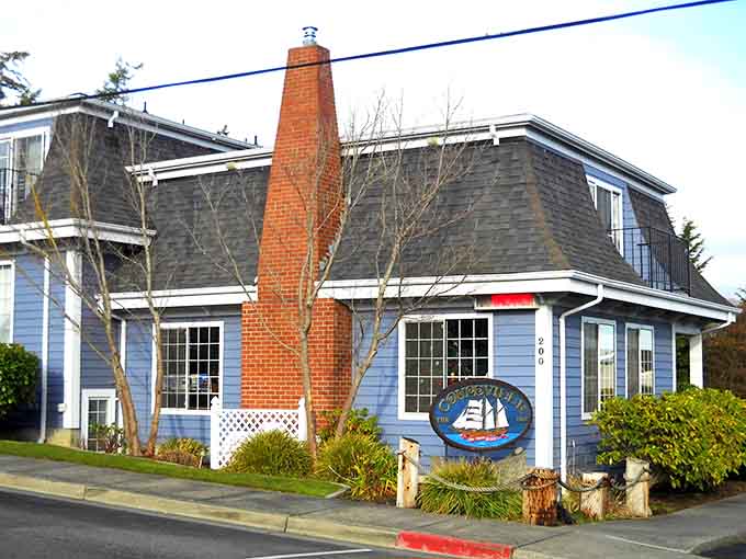 The Coupeville Inn's distinctive chimney standing tall, a cozy beacon for travelers seeking authentic island hospitality.