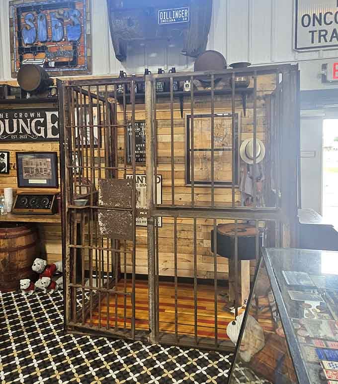 An actual vintage jail cell door stands ready to contain your most unruly decorating ideas or misbehaving houseguests permanently.
