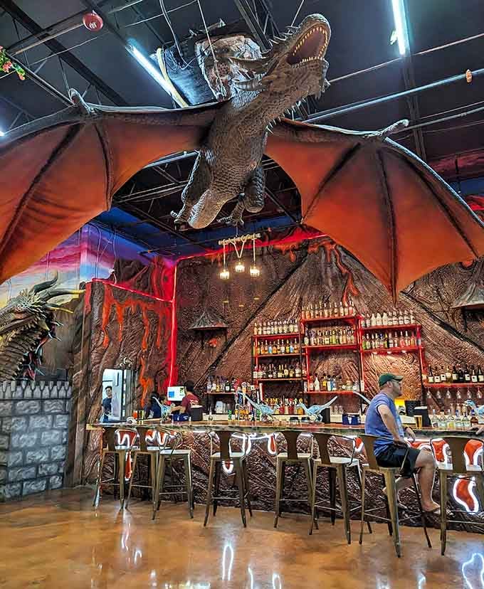 A massive winged creature guards the bar, making every beverage order feel slightly more epic than usual.