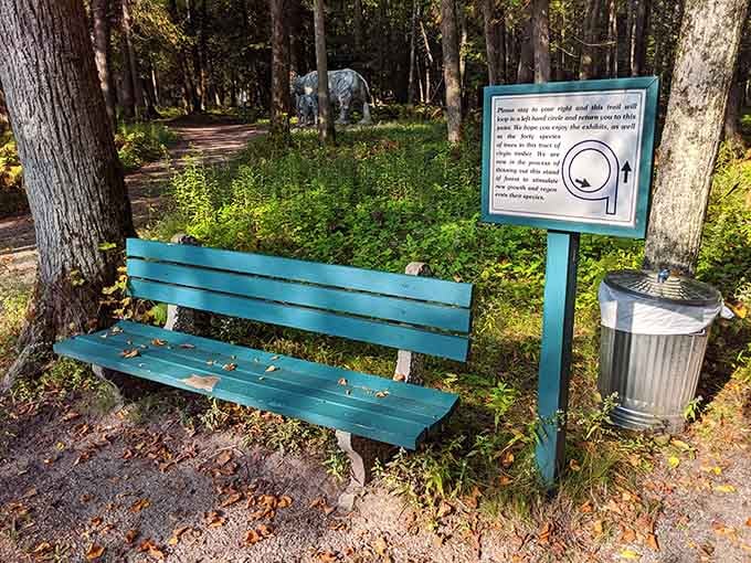 Take a breather on this bench and contemplate the fact that you're sitting in a dinosaur-filled Michigan forest.