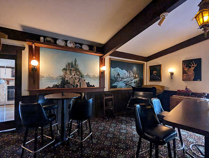 Cozy booths with scenic murals transport you to Bavarian landscapes without the expensive plane ticket required.