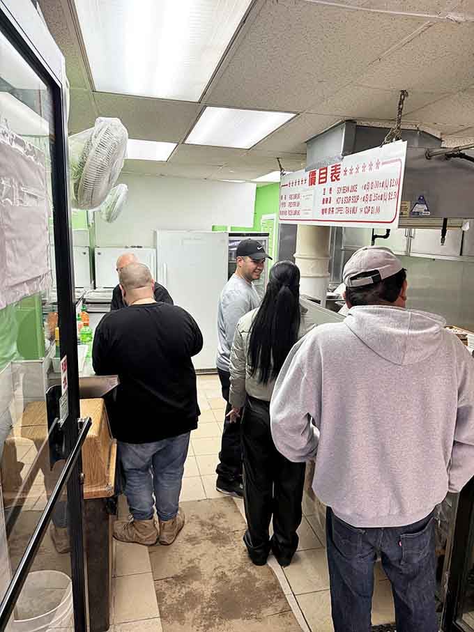 The queue of happy customers waiting for dumplings that cost less than the subway ride it took to get here.