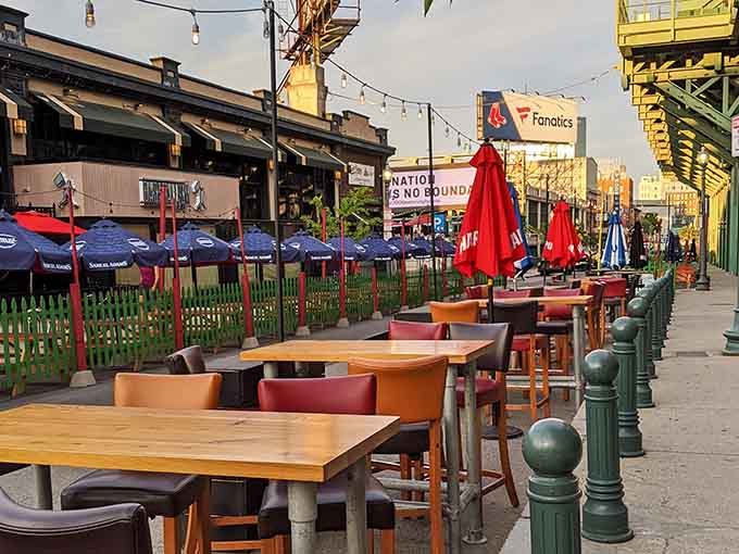 Outdoor seating on Lansdowne Street lets you soak up the Fenway atmosphere before heading inside for the main event.