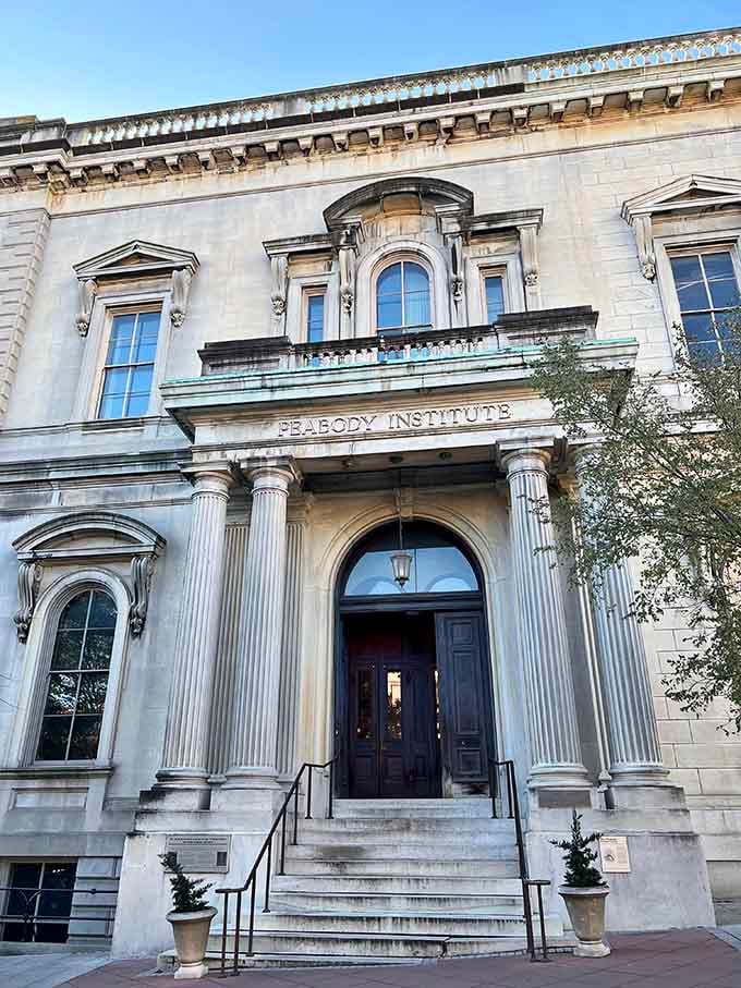 The Peabody Institute entrance stands dignified and welcoming, like a wise professor inviting you into scholarly sanctuary within.