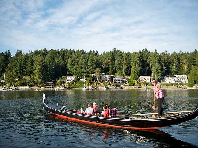 Gig Harbor Gondola glides past waterfront homes, bringing a slice of Venice to the Pacific Northwest's shores.