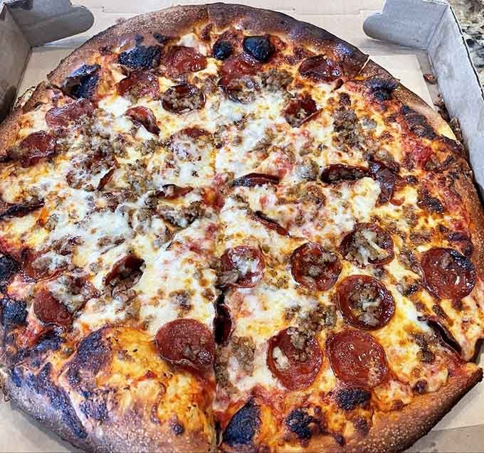 Pepperoni and sausage pizza with that perfect char&mdash;this is what pizza dreams are genuinely made of.