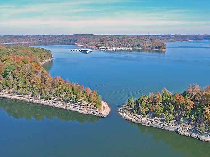 Aerial views reveal the lake's stunning geography with dramatic peninsulas and coves creating endless opportunities for exploration and discovery.