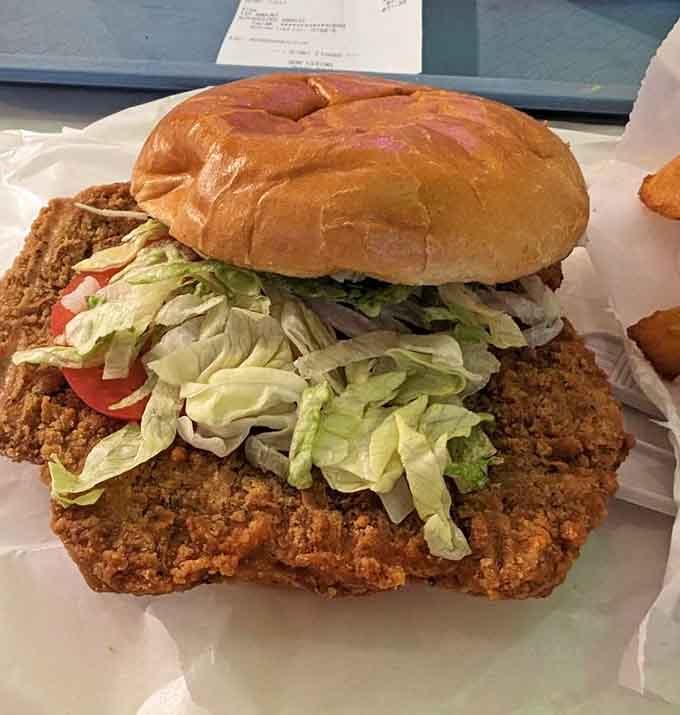 The tenderloin sandwich arrives bigger than your head, which is exactly how breaded pork should make its entrance.