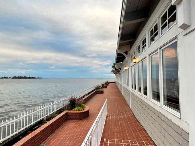 The brick patio walkway leads to lakefront views that make you forget you're in the Midwest.