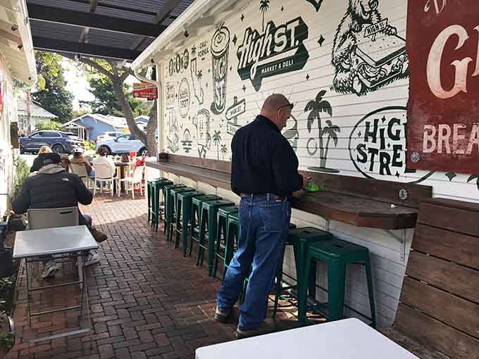 Counter seating along the wall offers prime people-watching real estate while you demolish your sandwich order.