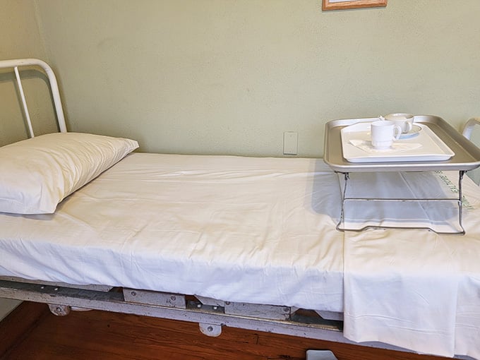 A hospital bed that's seen better days, reminding us how far patient comfort has come since then.