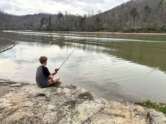 Sometimes the best fishing spot is a quiet rock where patience meets possibility and hope.