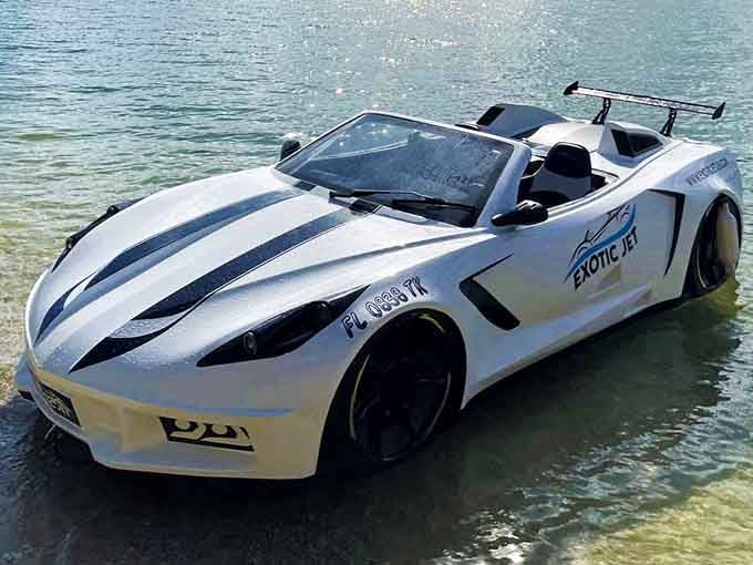 White and sleek in shallow paradise, looking like it drove straight out of a futuristic movie into reality.