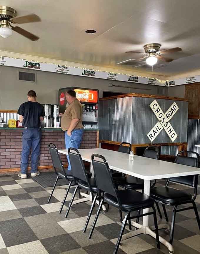 Ceiling fans spinning above while folks gather at the counter, just like diners have operated since your parents were dating.