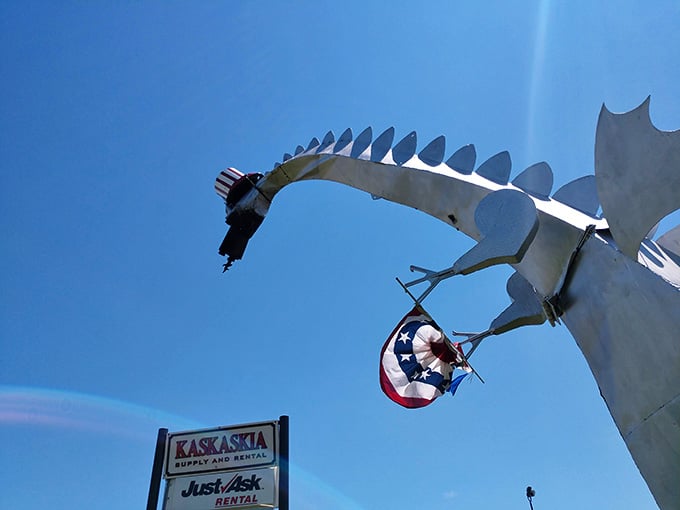 Looking up at those metal scales and patriotic accessories, you realize someone's wild dream became our reality.