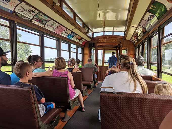 A vintage trolley car rolling through the park grounds. This is the kind of surprise that makes a day unforgettable.