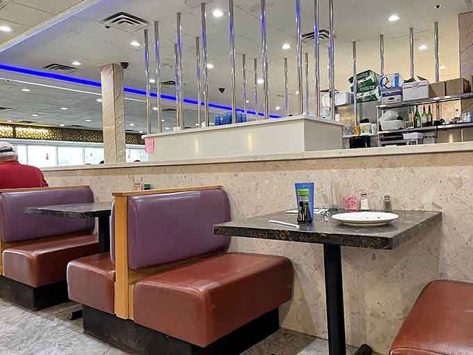 Comfortable booths with marble tables where you can strategize your next plate without judgment from anyone but yourself.