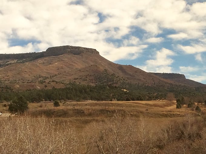 Mountains rise in the distance, reminding you that dramatic landscapes aren't exclusive to expensive resort towns.