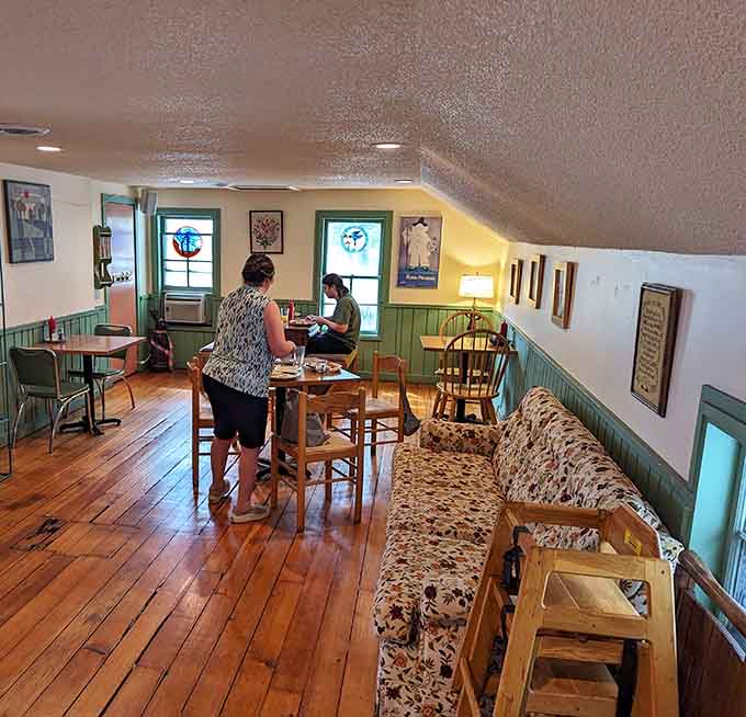 Upstairs seating offers a quieter retreat for those who prefer their morning bun experience with a side of contemplation.