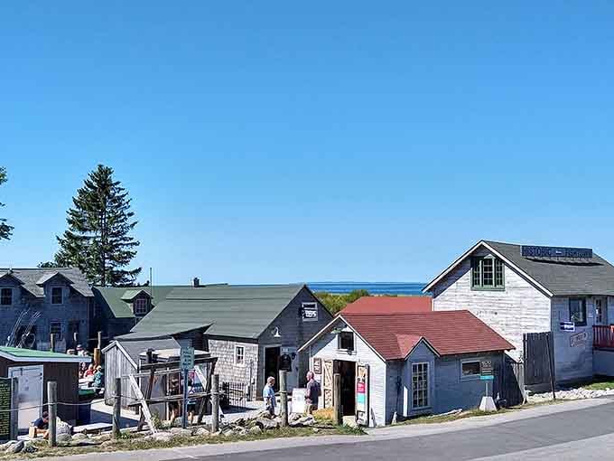 Fishtown's weathered shanties cluster together like old friends sharing stories from a century of lake life.