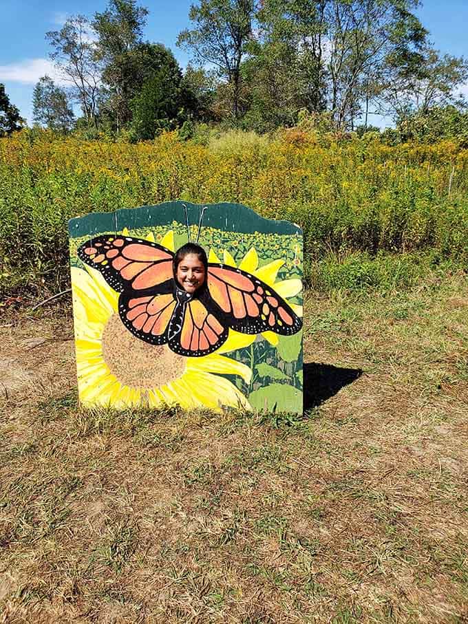 Even the photo ops here embrace the butterfly effect, letting visitors spread their wings among the blooms.