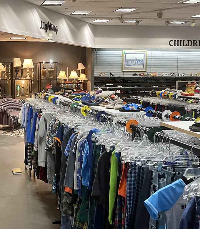 Lamps and children's clothing sharing space, because why shouldn't you brighten your home and wardrobe simultaneously?