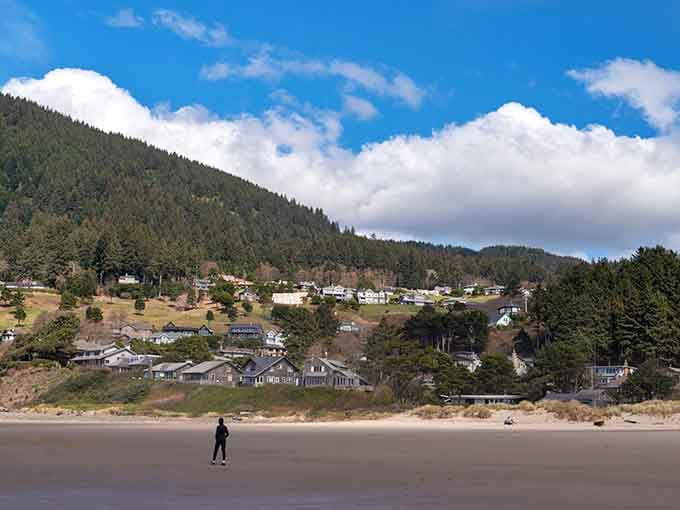 The town spreads out below Neahkahnie Mountain, a postcard that somehow became your actual temporary address.