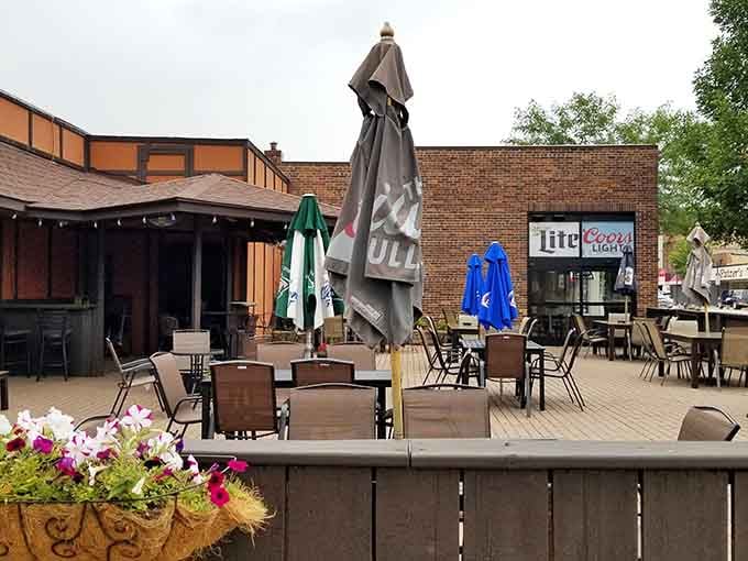 Outdoor seating invites leisurely meals where lingering doesn't require apologizing to impatient servers waiting tables.