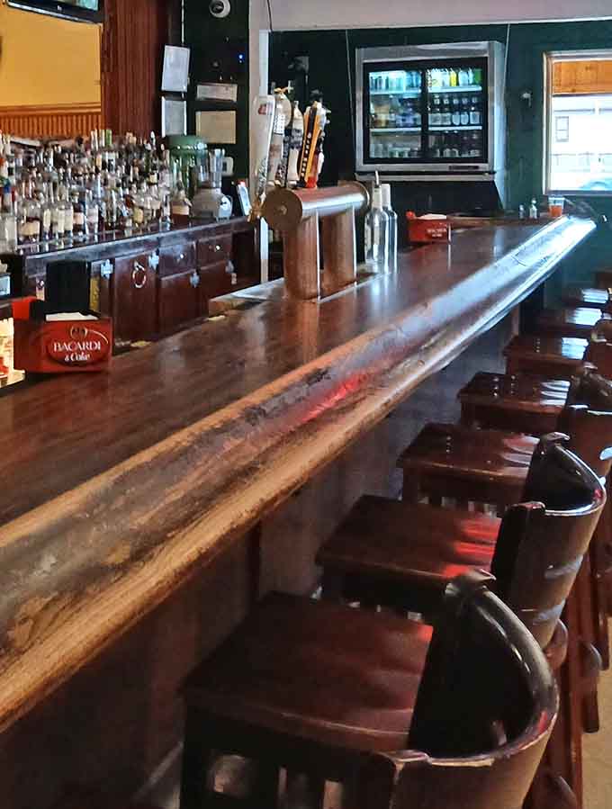 A well-stocked bar ready to pour whatever pairs perfectly with your meal, from beer to bourbon selections.
