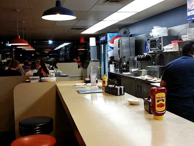 Counter seating offers front-row tickets to the breakfast show, where every order is prepared with practiced precision and care.