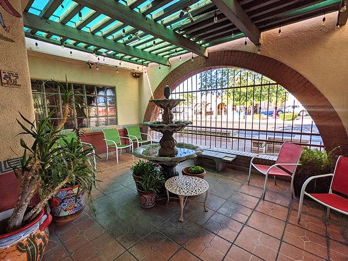 The waiting area with its fountain and potted plants makes even the inevitable wait feel like part of the experience.