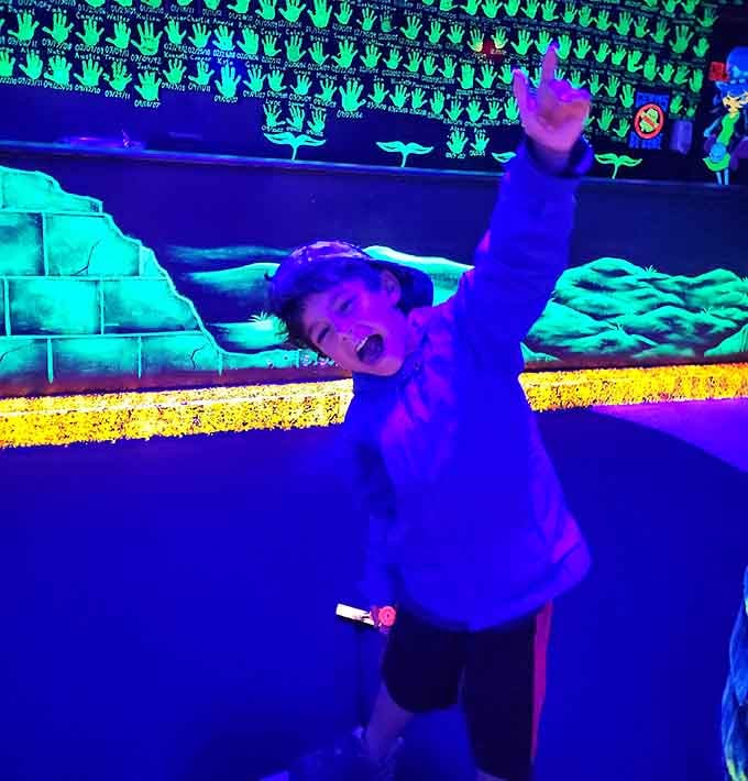 Pure joy captured in ultraviolet light, proving that some victories are worth celebrating no matter your score.