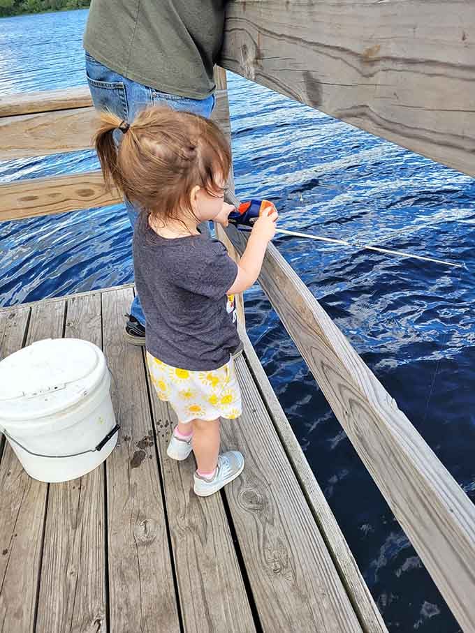 Young anglers start early at the dock, learning patience and the fine art of not falling in.