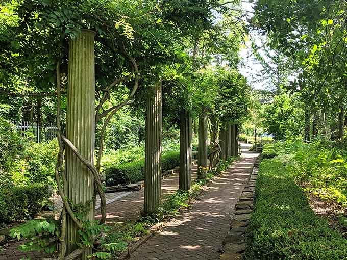 Garden pathways shaded by columns, perfect for contemplative walks or avoiding summer heat entirely.