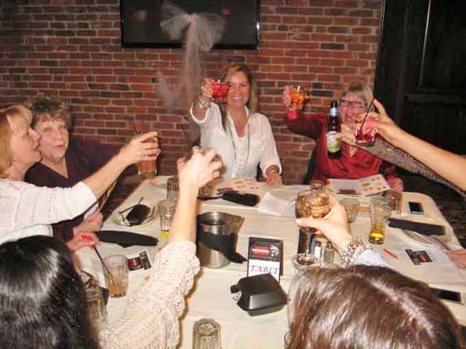 Toast to friendship, mystery, and the fact that nobody at this table is actually getting murdered tonight.