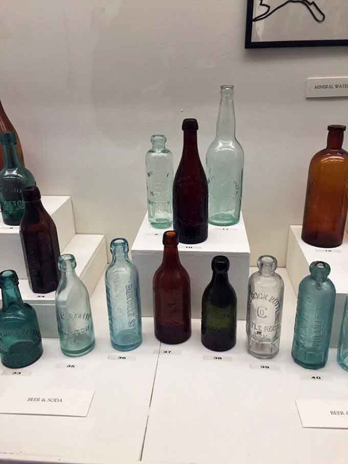 Vintage soda and beer bottles represent local breweries and bottlers that once thrived in every American community.