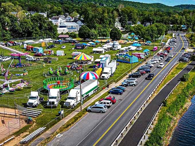 The annual carnival transforms the green into temporary chaos that somehow feels perfectly organized and wonderfully nostalgic.