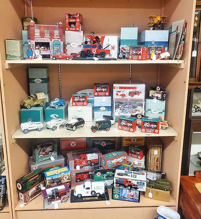 Collectible toy vehicles organized with the precision of a museum curator who really loves tiny trucks.