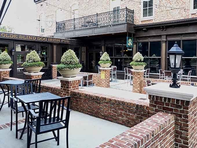 Those brick half-walls provide just enough separation to feel cozy without feeling cramped or isolated.
