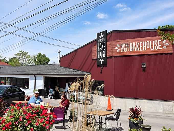 Outdoor seating surrounded by flowers, perfect for enjoying your baked goods al fresco style.