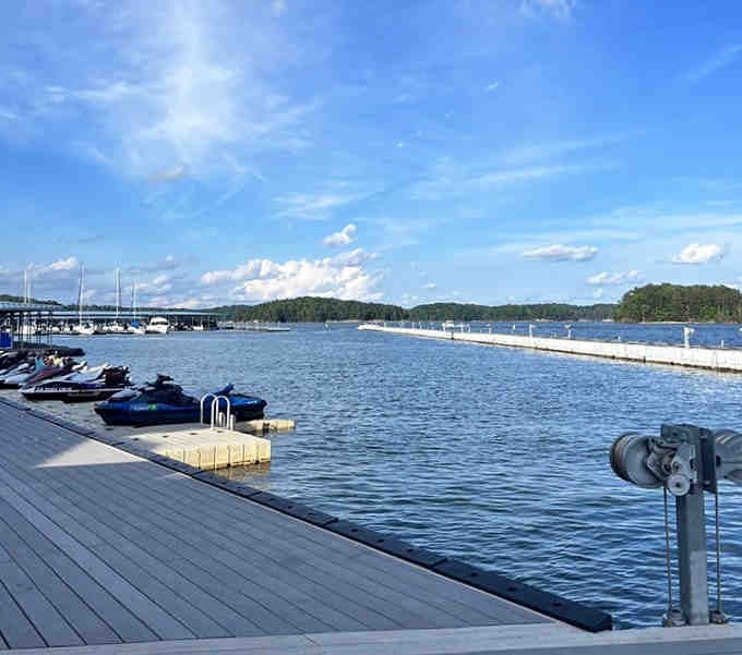 Jet skis docked and ready, because the best restaurants let you arrive by land or by water.