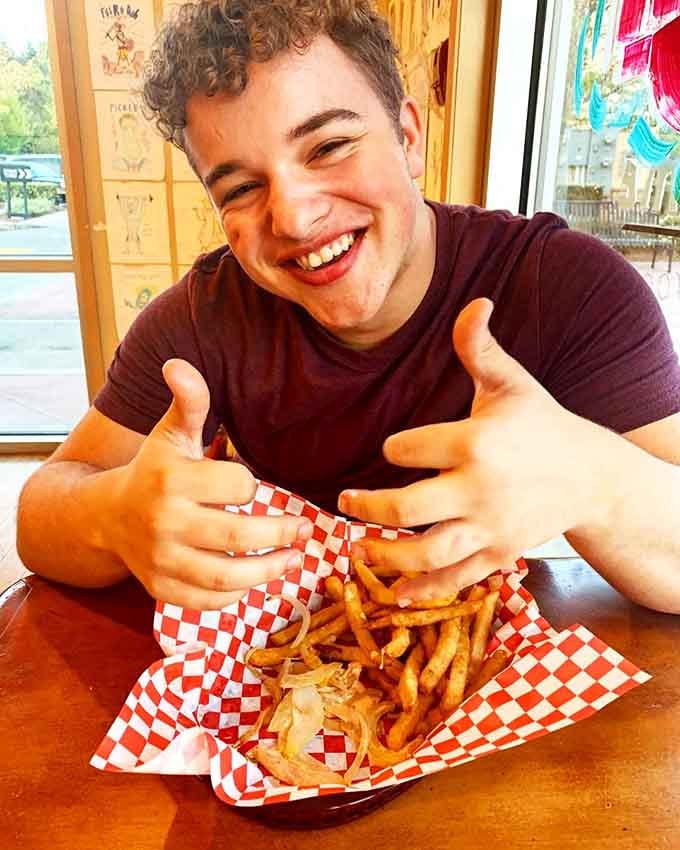 Pure joy captured in one moment, because great food should make you this genuinely, unabashedly happy always.