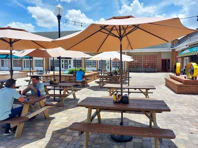 Outdoor seating lets you enjoy your sandwich under Florida sunshine with proper shade coverage provided.