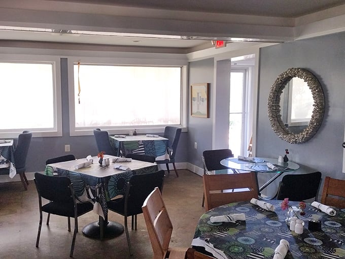 Floor-to-ceiling windows frame the river view like nature's own IMAX screen, constantly changing with the light.