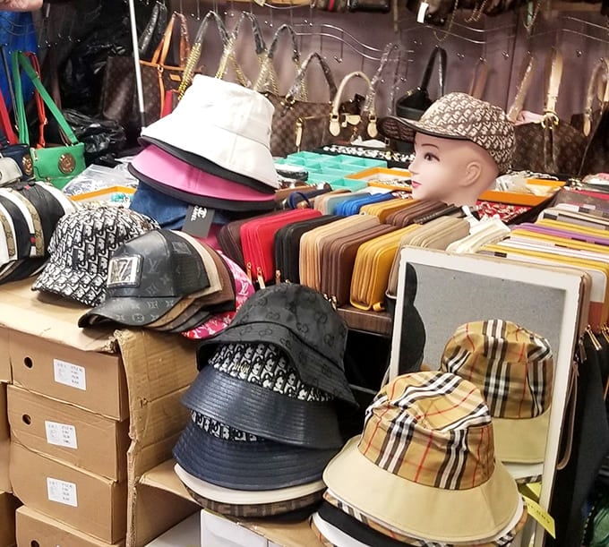 Hats and wallets compete for attention in this wonderfully chaotic display of fashion accessories.