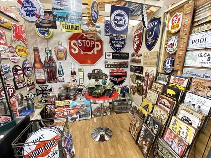 Vintage advertising signs covering the walls, when Coca-Cola and motor oil came with genuinely cool graphic design.